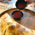 How to Eat a Calzone: A Step-by-Step Guide - The Enlightened Mindset